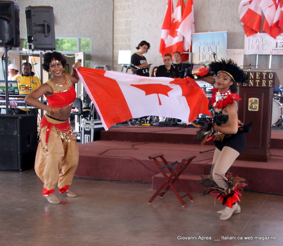 flag and dancers – A Touch of Love and Hope